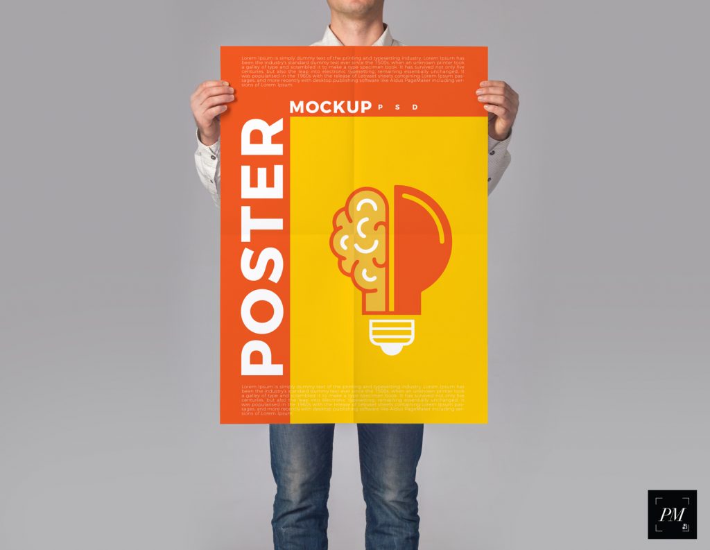 Man Holding Poster Mockup PSD To Showcase Creative Designs - Poster Mockup